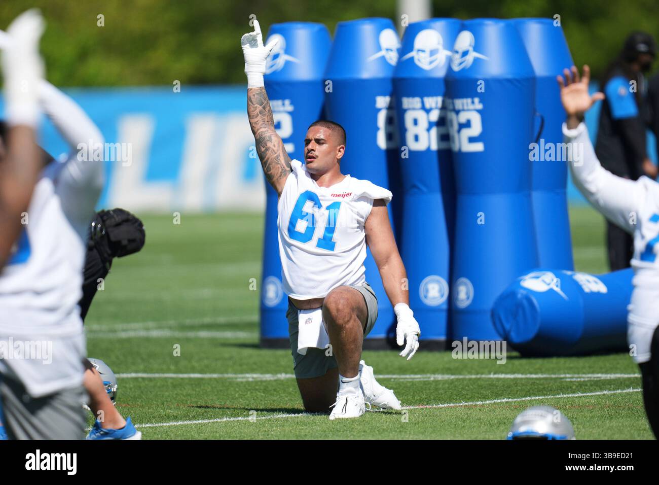 Detroit Lions defensive lineman Ahmed Hassanein (61) stretches during ...