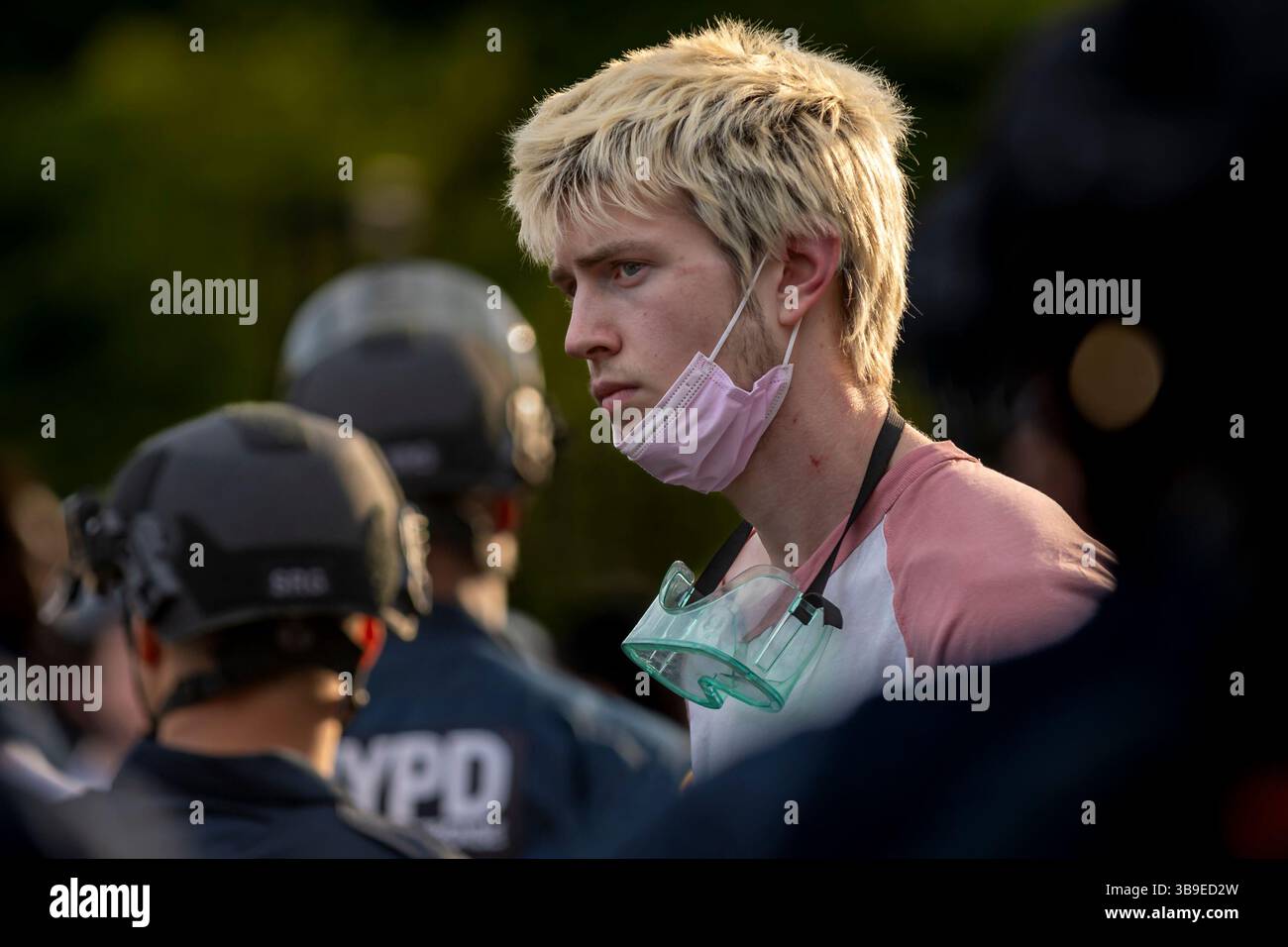 NEW YORK, NEW YORK - MAY 8: ??A ?handcuffed protester ?with welts on ...