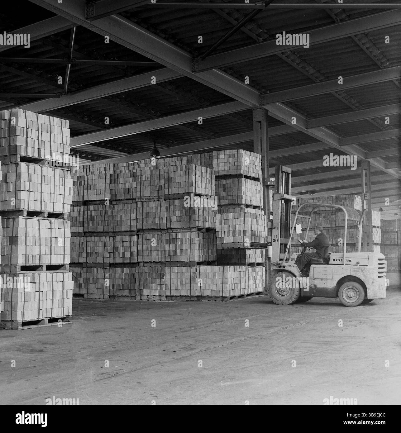 1950s, historical, inside a warehouse of the Steel Company of Wales ...