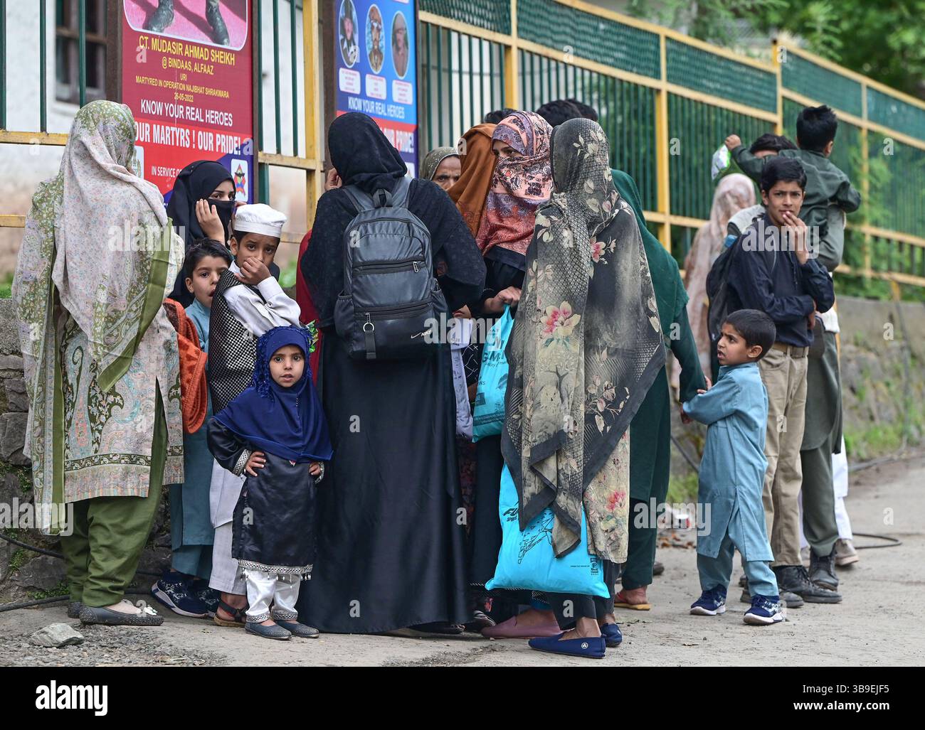 URI, INDIA - MAY 9: People leave their homes after overnight artillery ...