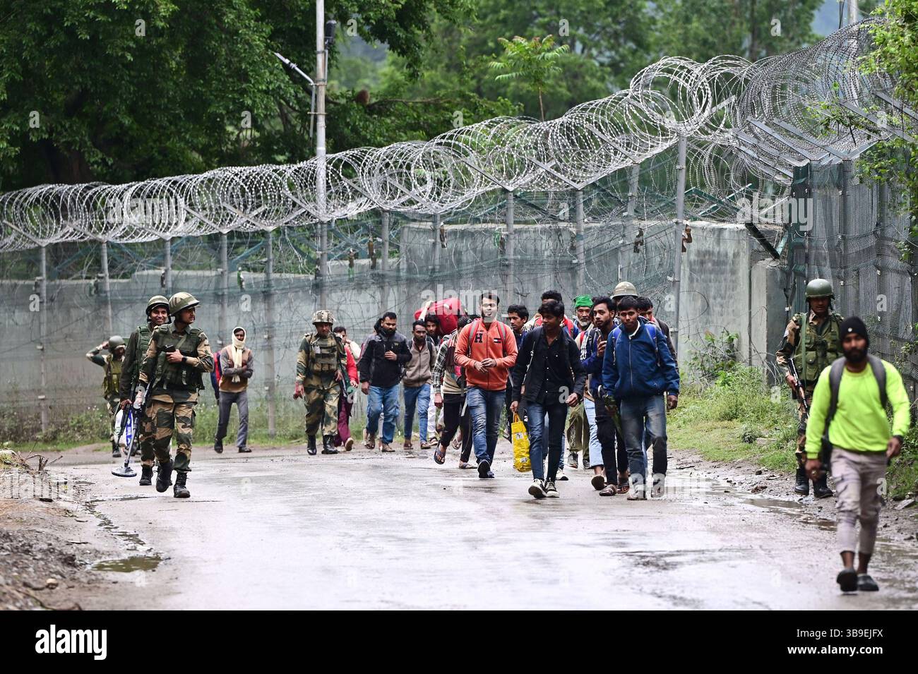 URI, INDIA - MAY 9: Labourers from outside state leave after overnight ...