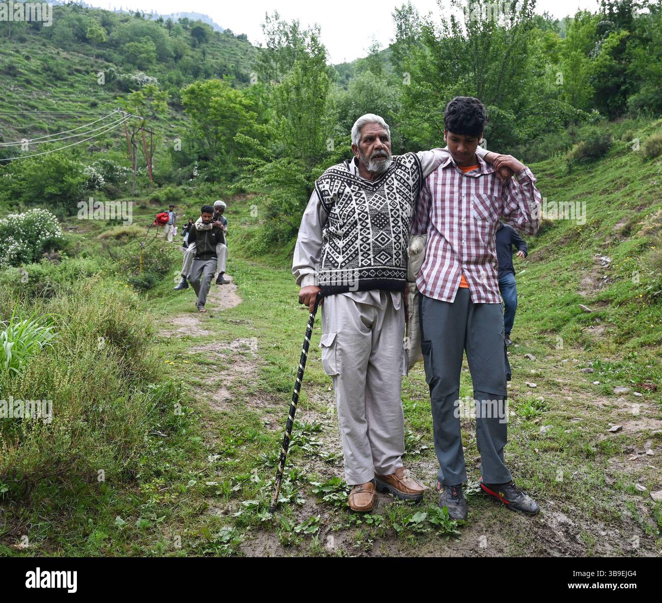 URI, INDIA - MAY 9: People leave their homes after overnight artillery ...