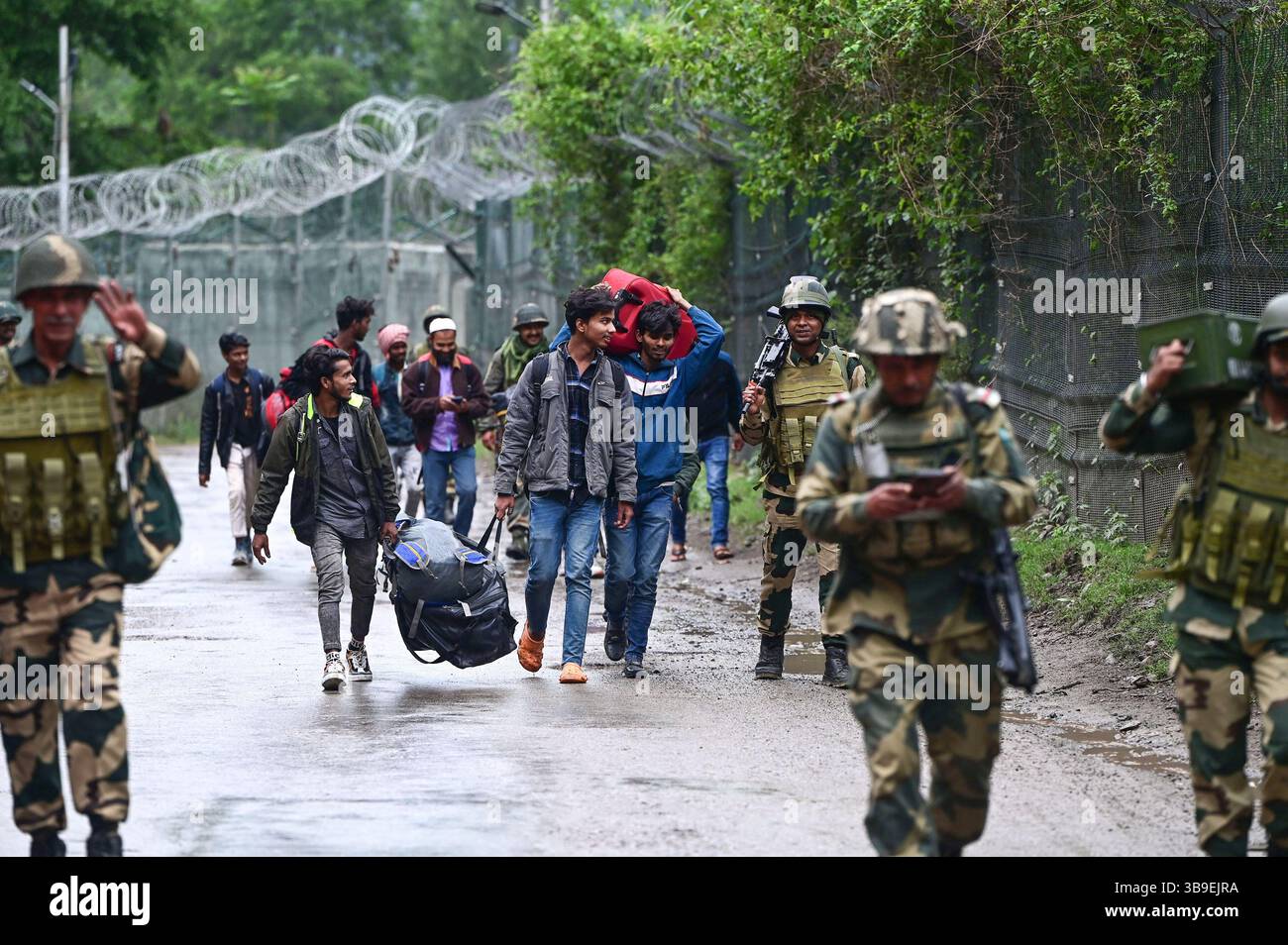 URI, INDIA - MAY 9: Labourers from outside state leave after overnight ...