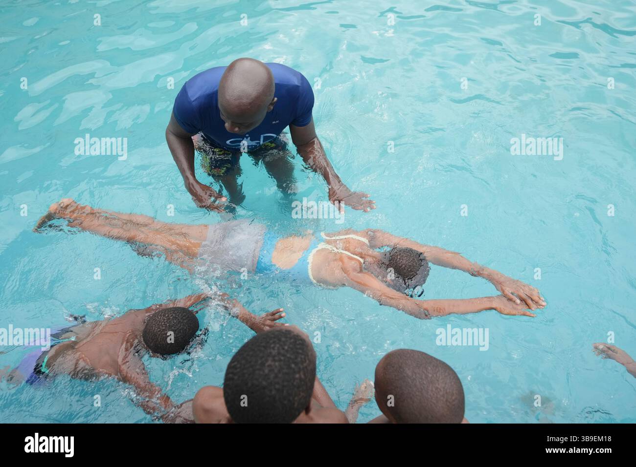 Swimming coach Emeka Chuks Nnadi teaches young, disabled students to ...