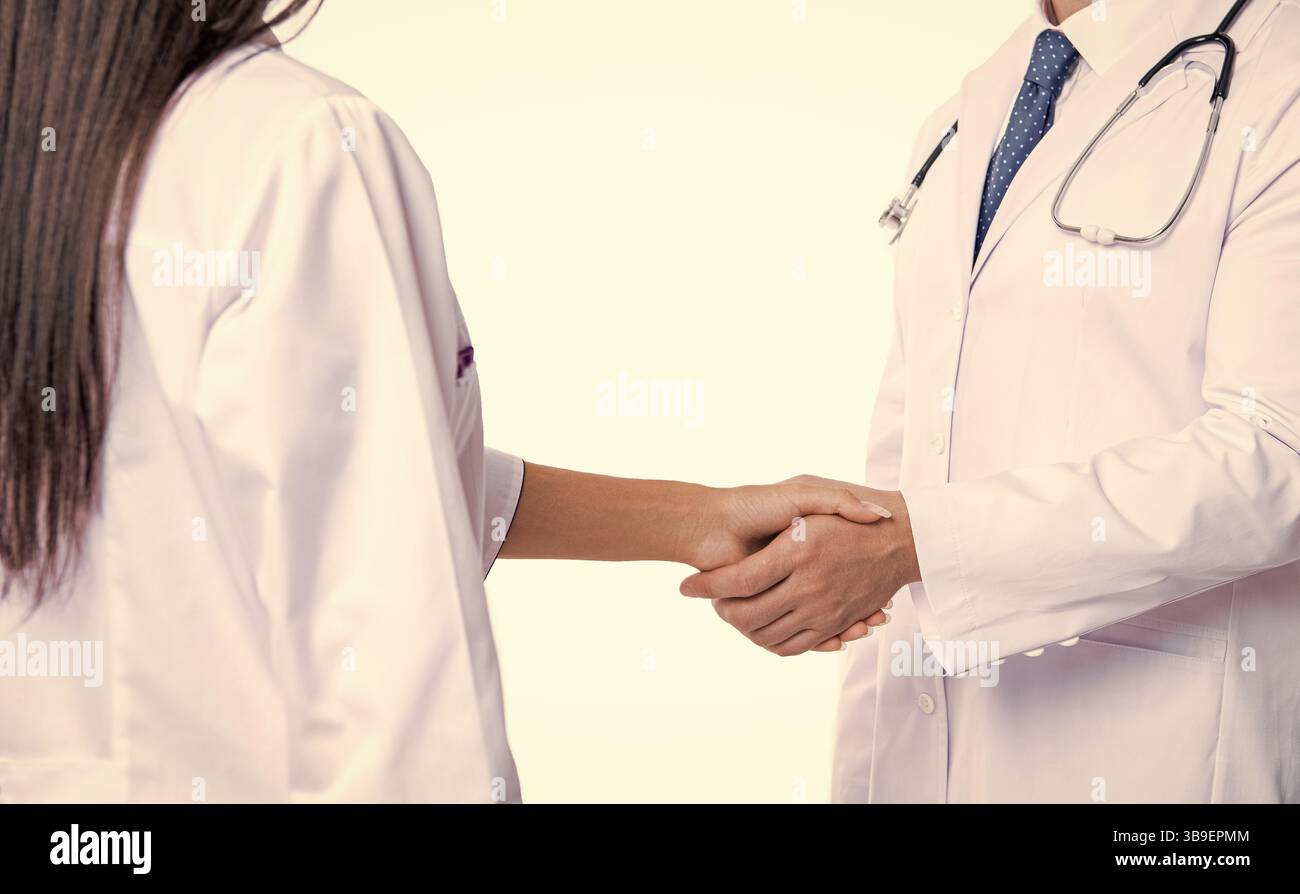 successful treatment. doctor handshake with nurse. two doctor shaking ...