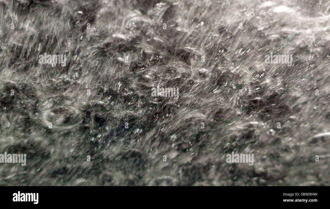 Foam and water on windscreen Stock Photo - Alamy