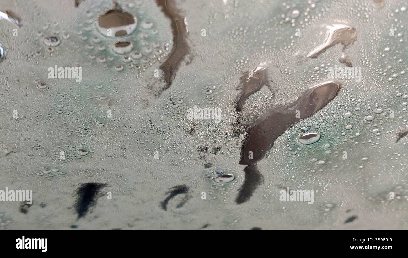 Foam and water on windscreen Stock Photo - Alamy