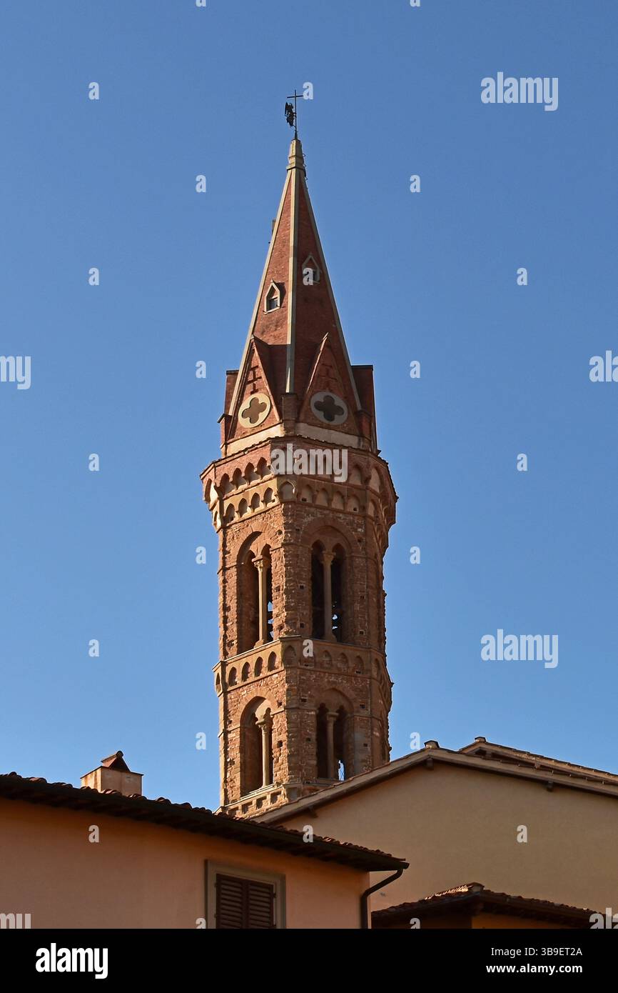 The church tower of the Badia Fiorentina looks over the roofs of ...