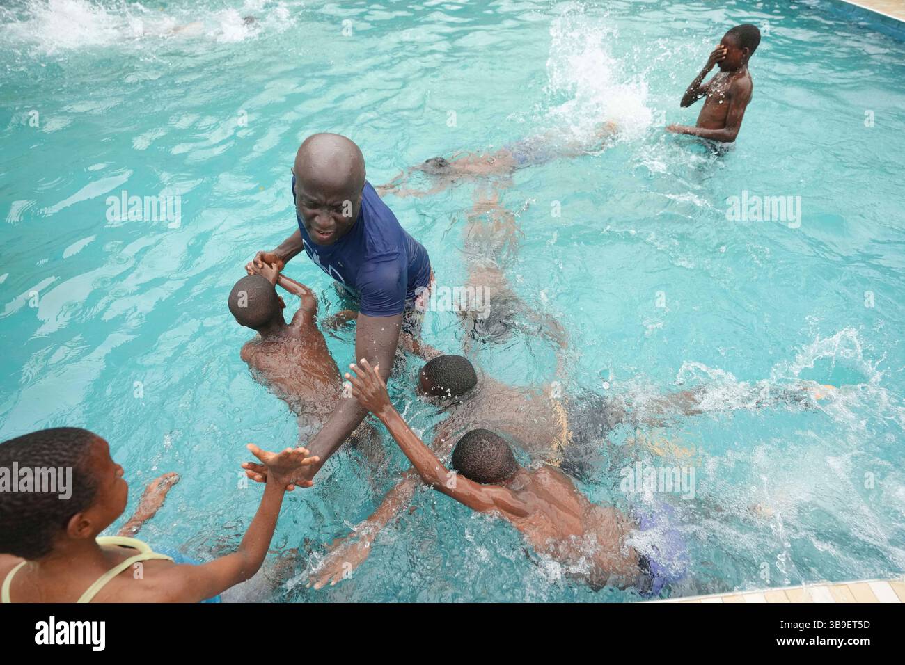 Swimming coach Emeka Chuks Nnadi teaches young, disabled students to ...