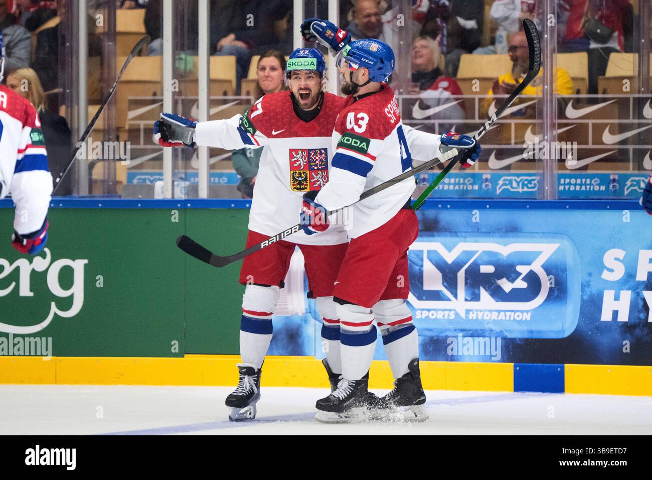Czech Republic's Filip Pyrochta, left, celebrates with Michael Spacek ...