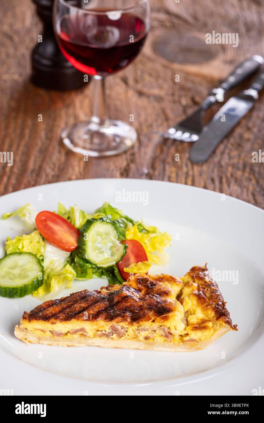French quiche Lorraine with salad Stock Photo - Alamy