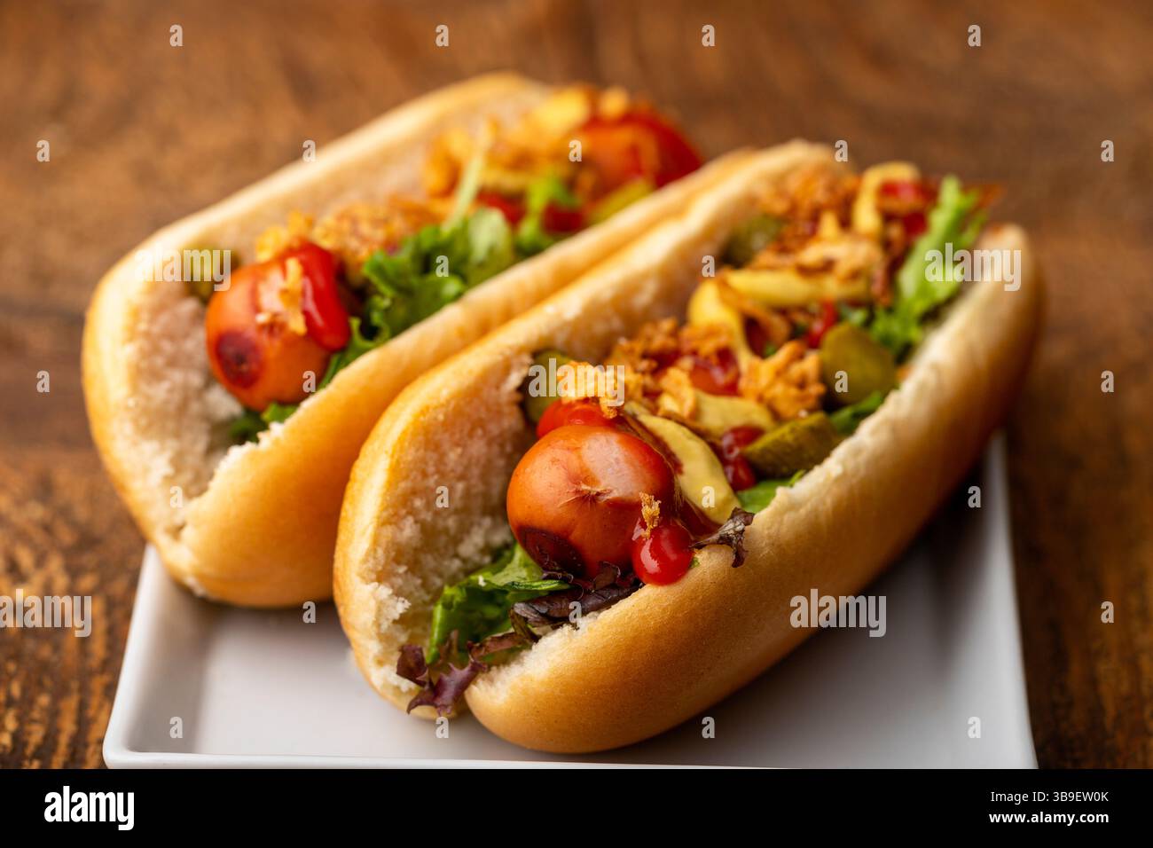 Hot dog in bun mustard hi-res stock photography and images - Alamy