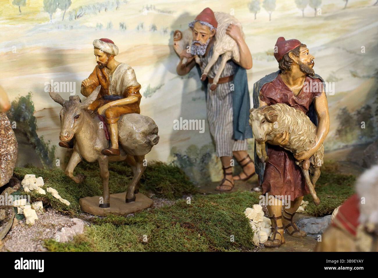 Nativity figurine, Shepherd with sheep Stock Photo - Alamy