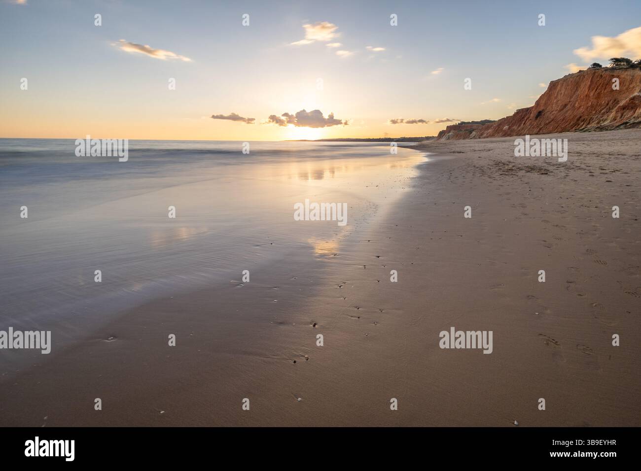 The golden sandy beach of Praia da Falésia with its characteristic ...