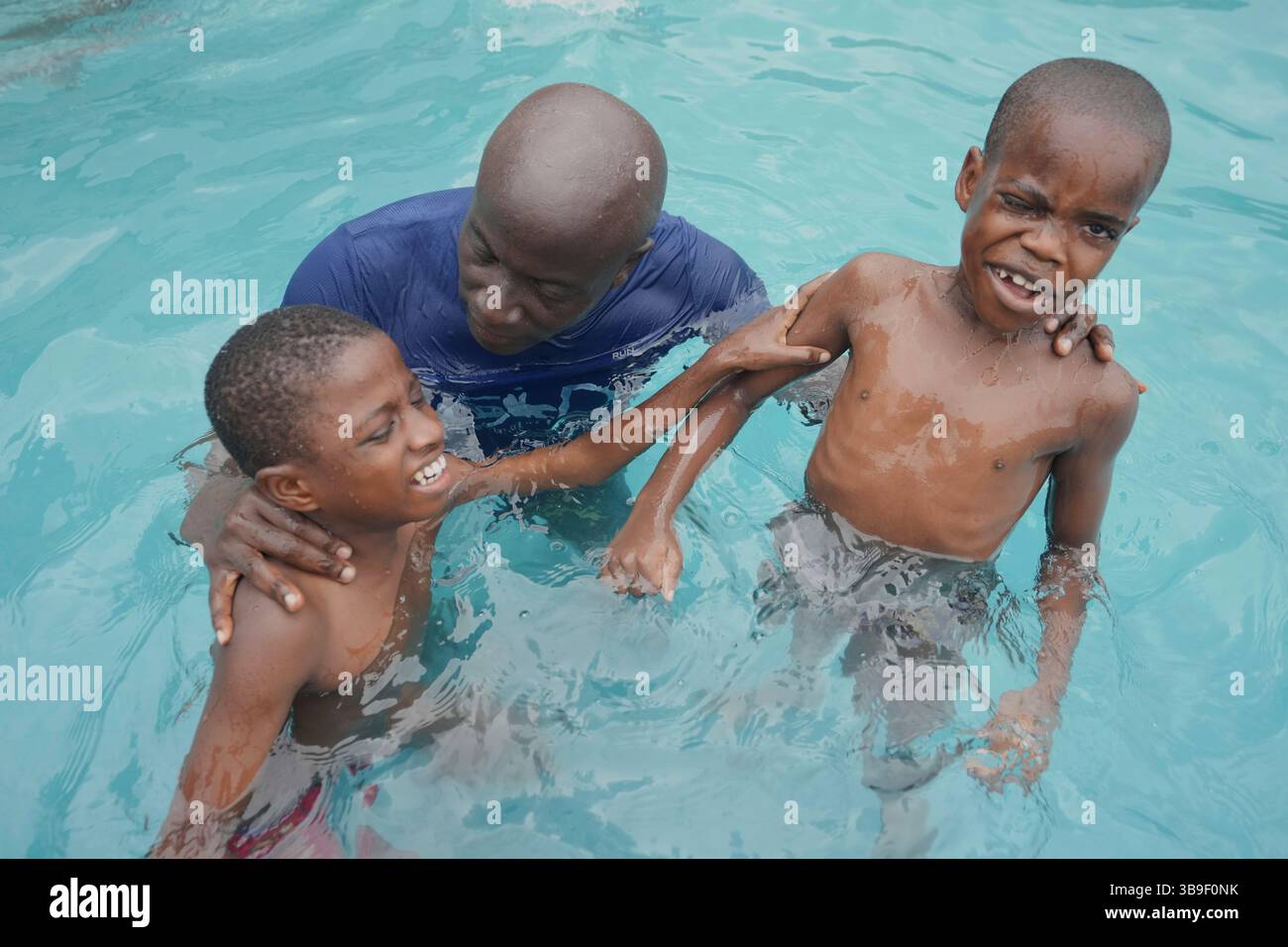 Swimming coach Emeka Chuks Nnadi teaches young, disabled students to ...