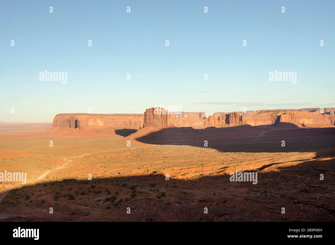 Long shadows in national monument valley hi-res stock photography and ...