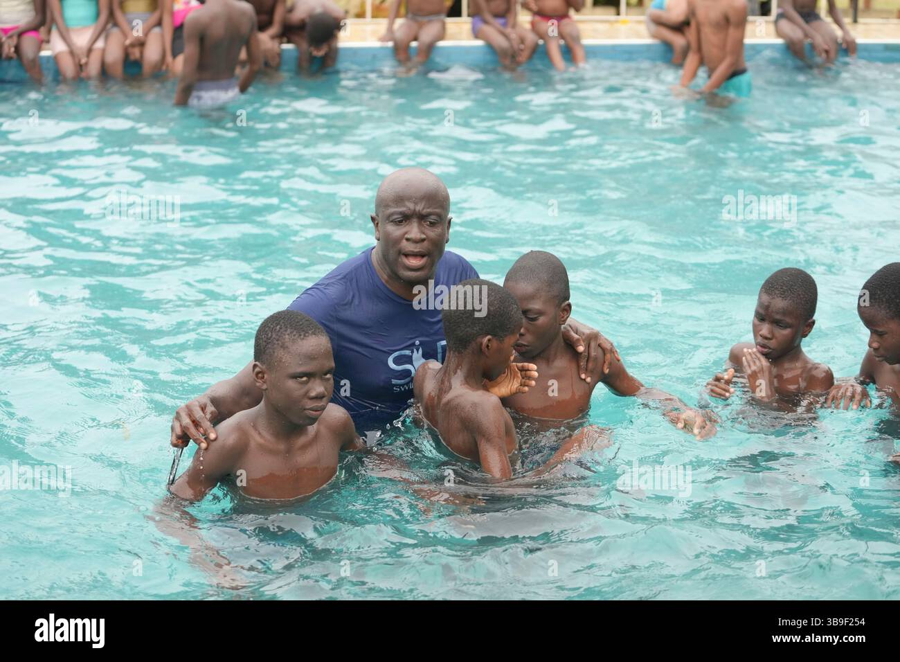 Swimming coach Emeka Chuks Nnadi teaches young, disabled students to ...