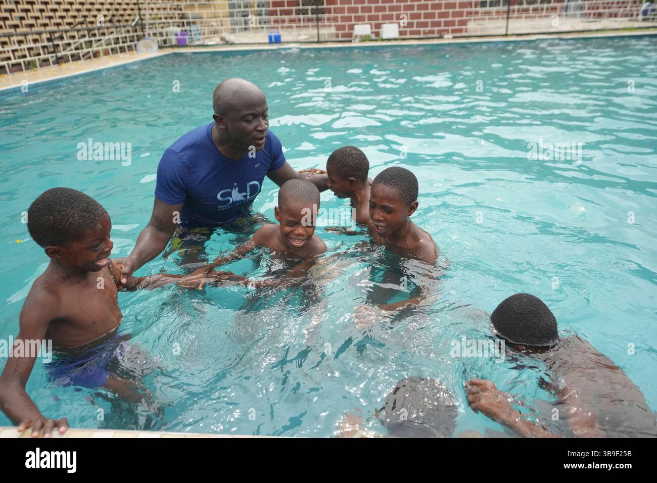 Swimming coach Emeka Chuks Nnadi teaches young, disabled students to ...