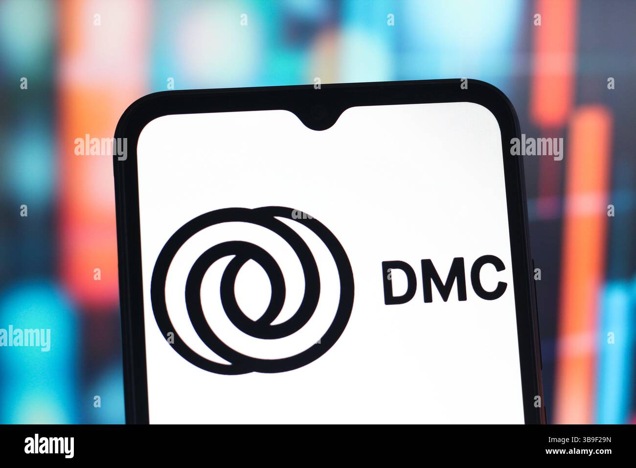 In this photo illustration, the DMC Global logo is seen displayed on a ...