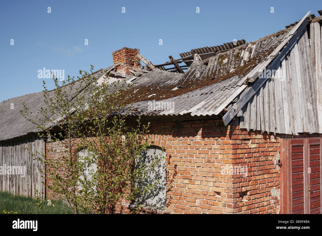 Old and very dangerous asbestos roof. Asbestos dust in the environment ...
