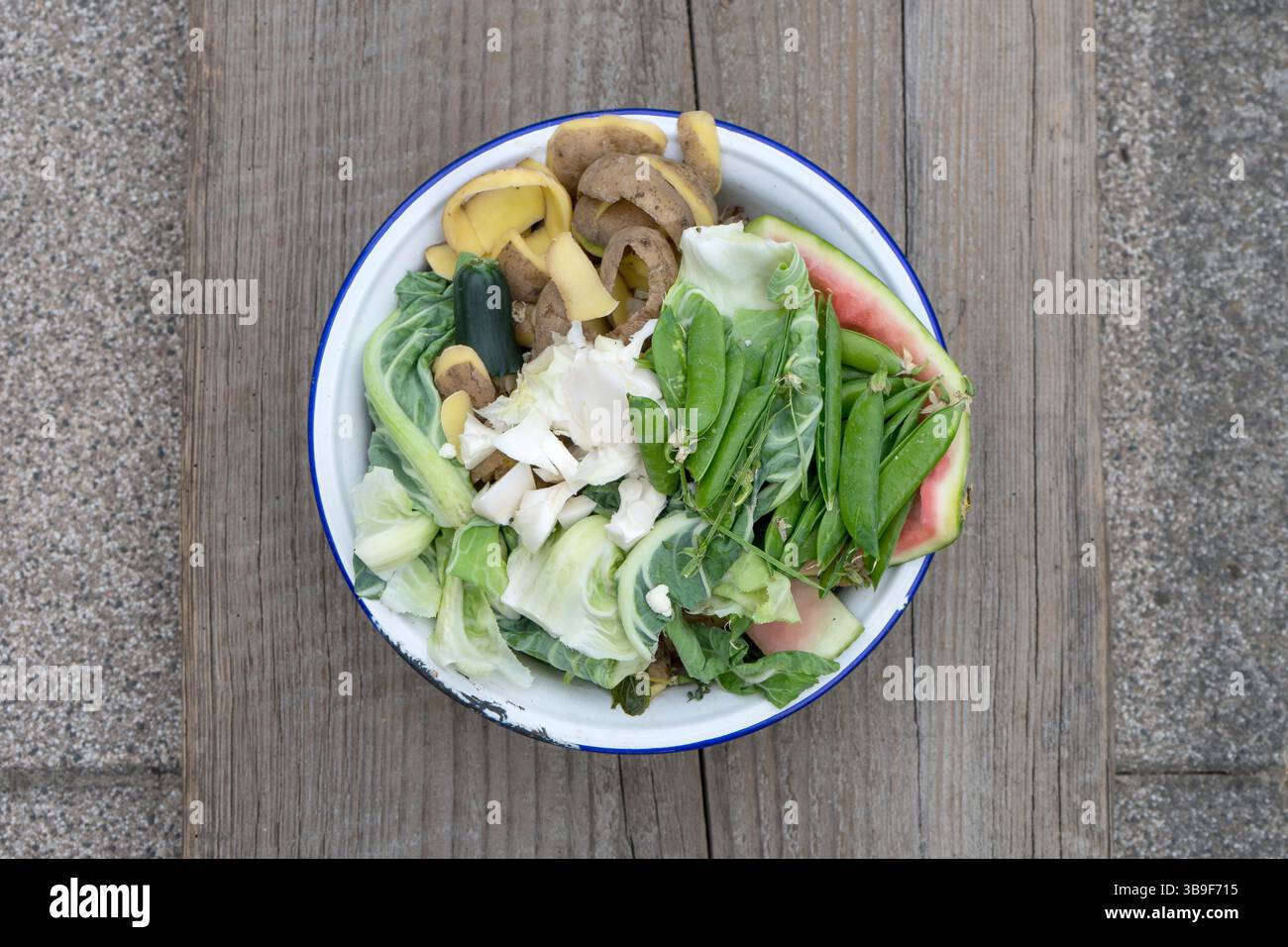 White bowl with kitchen waste Stock Photo - Alamy