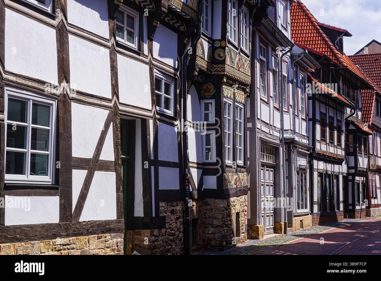 Street with beautiful historic half-timbered facades in the Old Town of ...