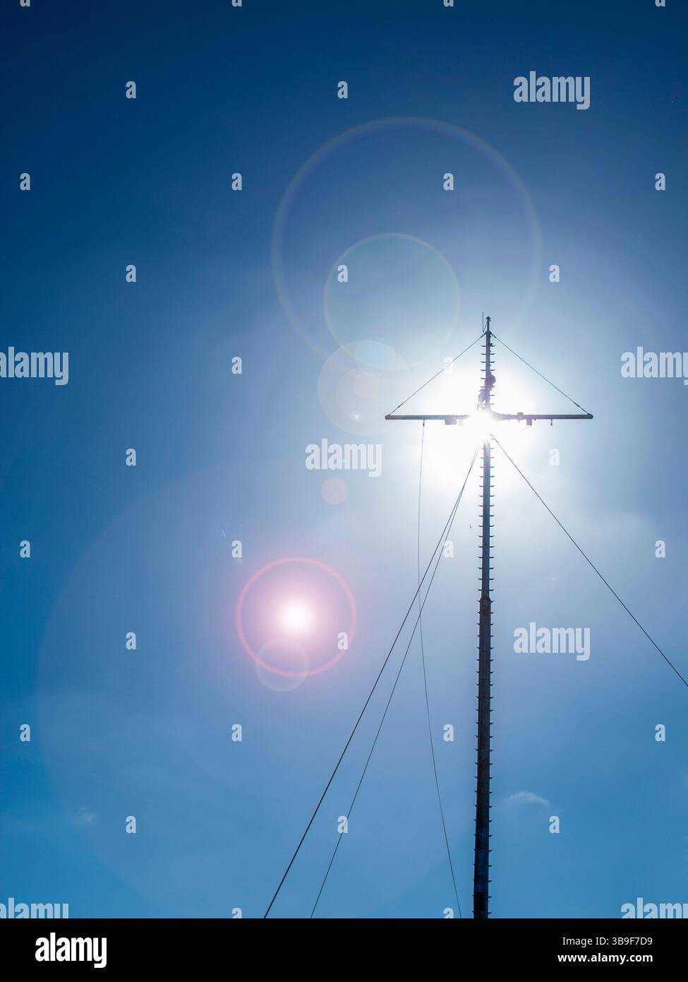 Radio mast in the back light lens flares low hi-res stock photography and images - Alamy
