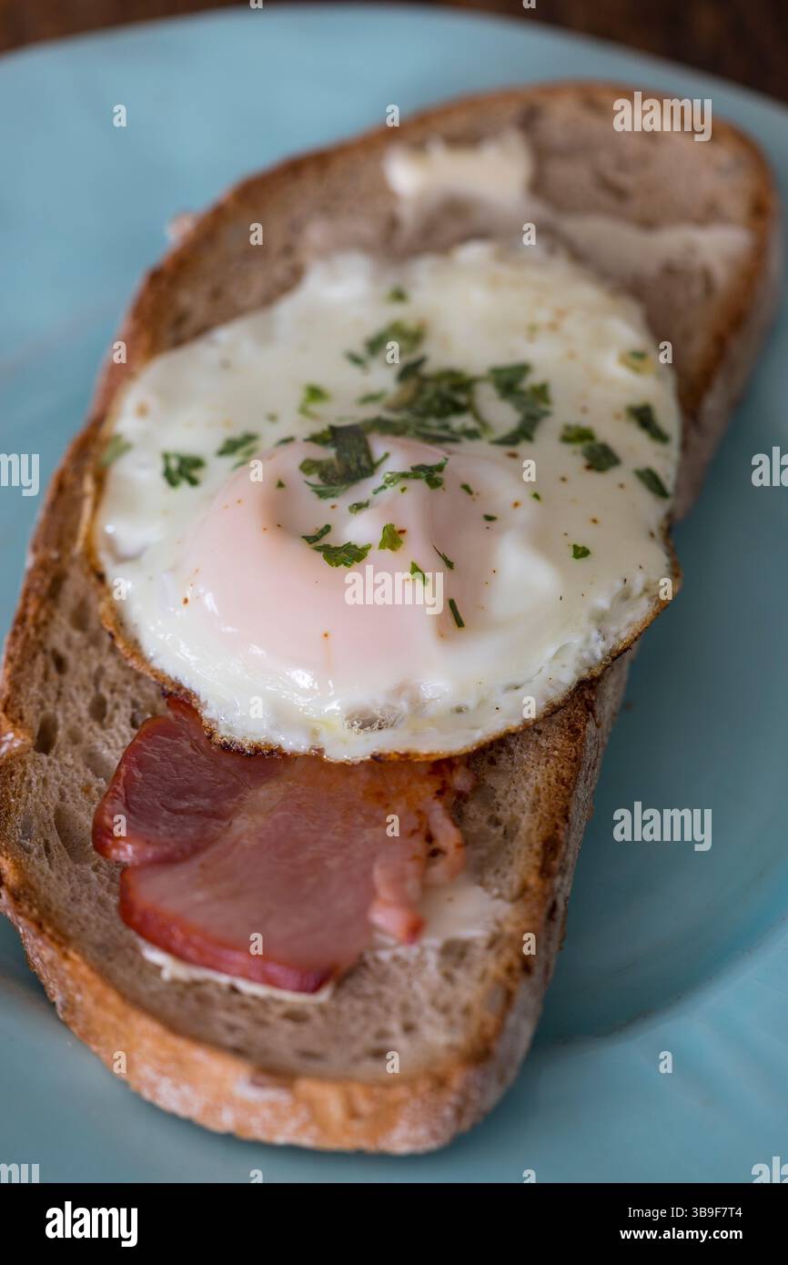 Bread with grilled ham and egg Stock Photo - Alamy