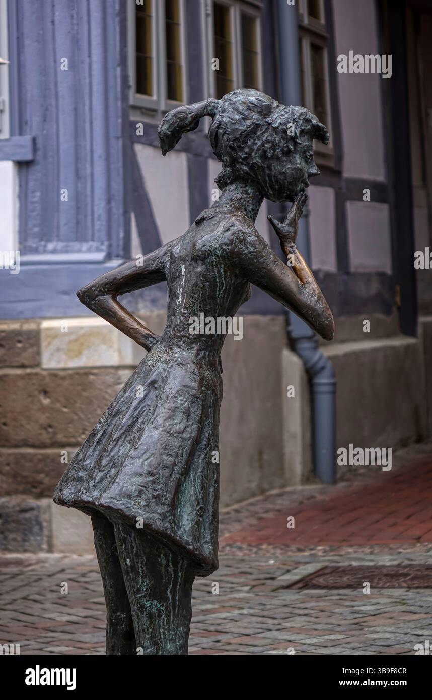 Beautiful statue in the old town of hamelin hi-res stock photography ...