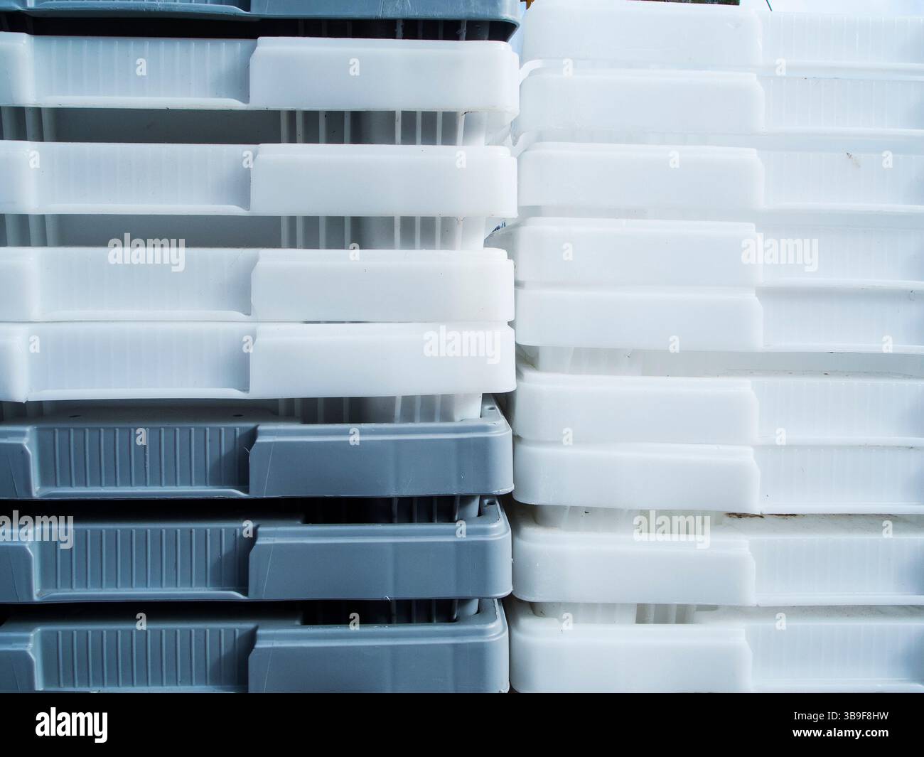 Stacked plastic containers Stock Photo - Alamy