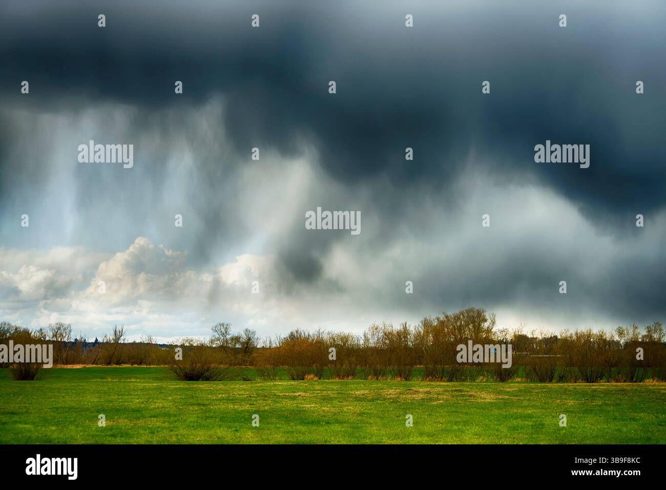 Big rain cloud over the landscape Stock Photo - Alamy