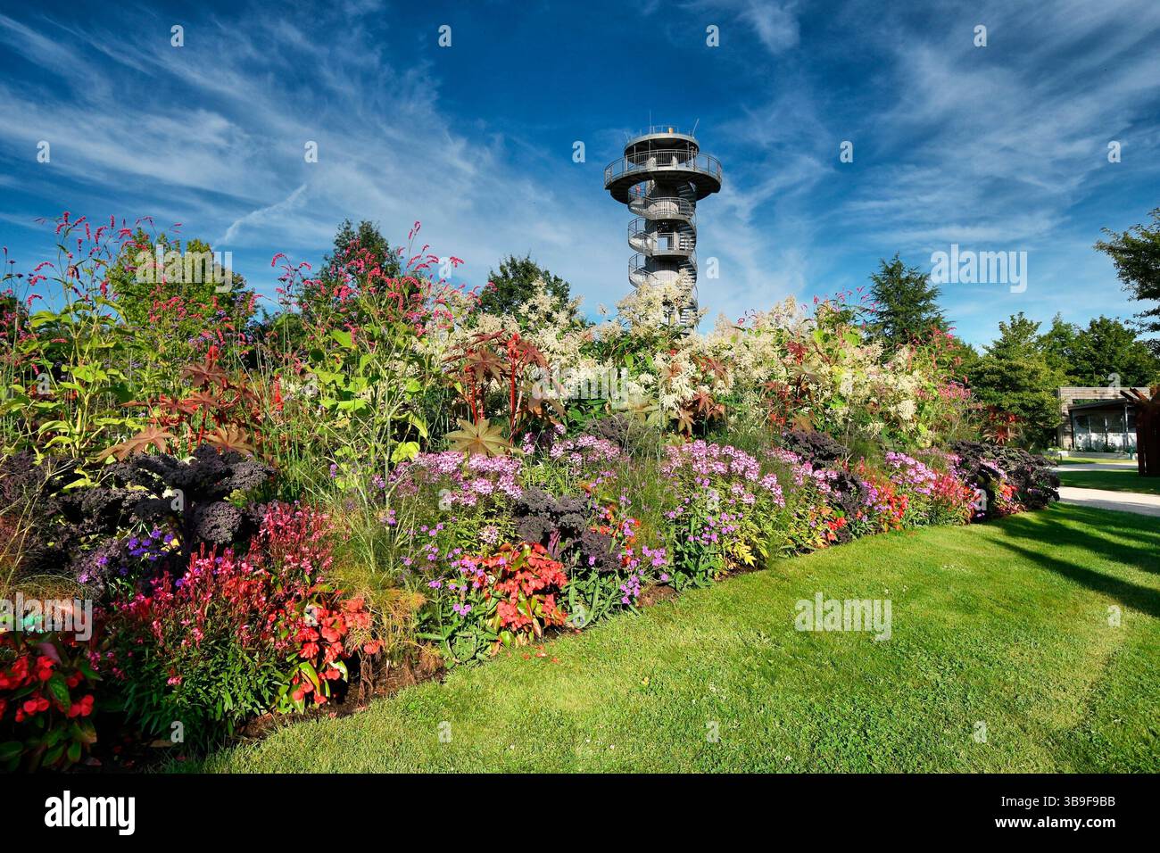 Summer flowers and a lookout tower in the Park der Gärten in Bad ...