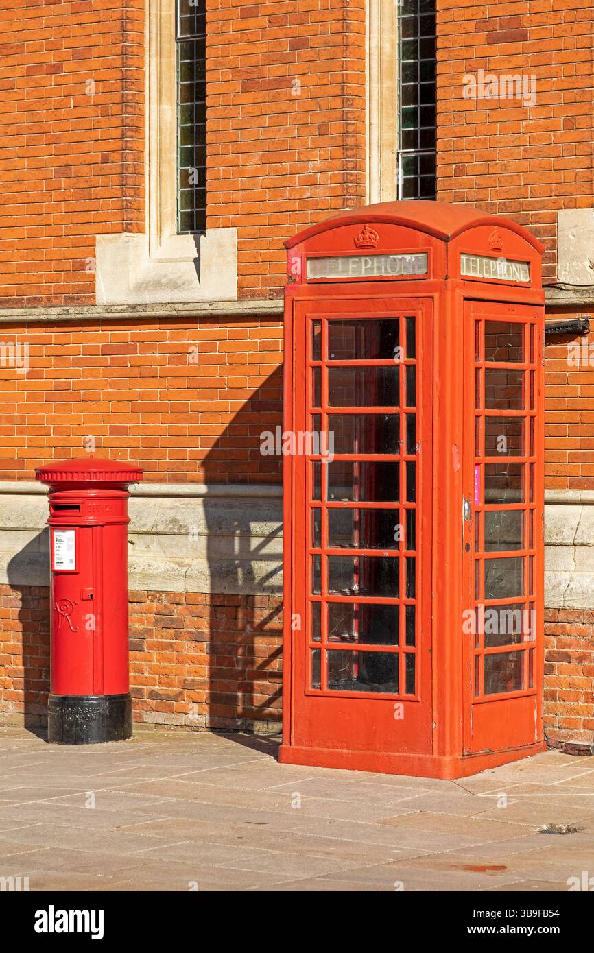 Red letter box and red telephone booth in front of The Royal ...