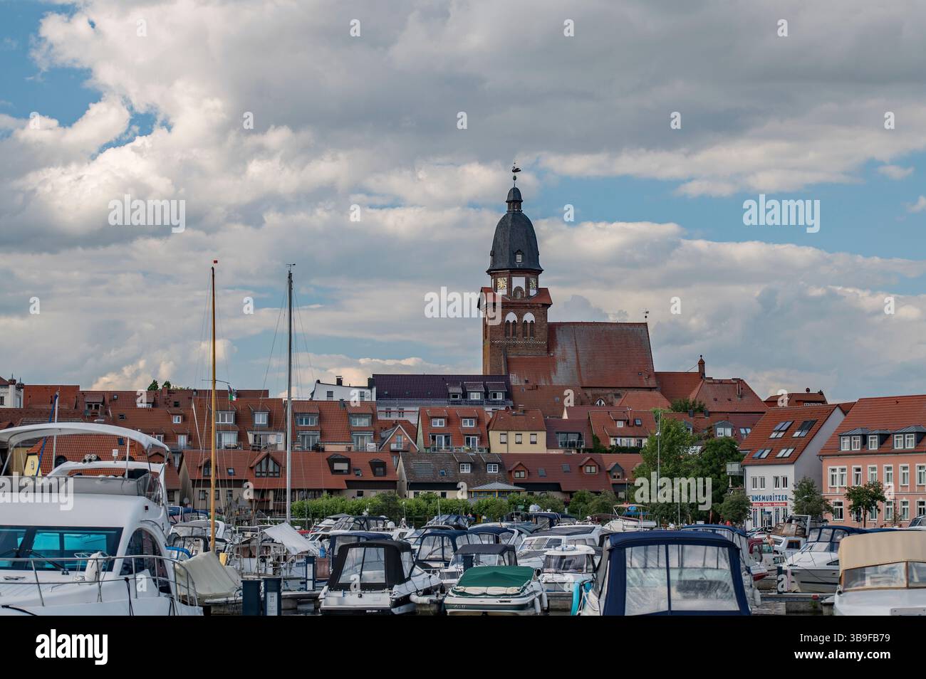Waren harbour with st marys church hi-res stock photography and images ...