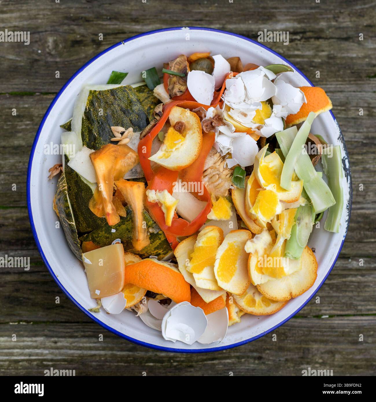 White bowl with kitchen waste Stock Photo - Alamy