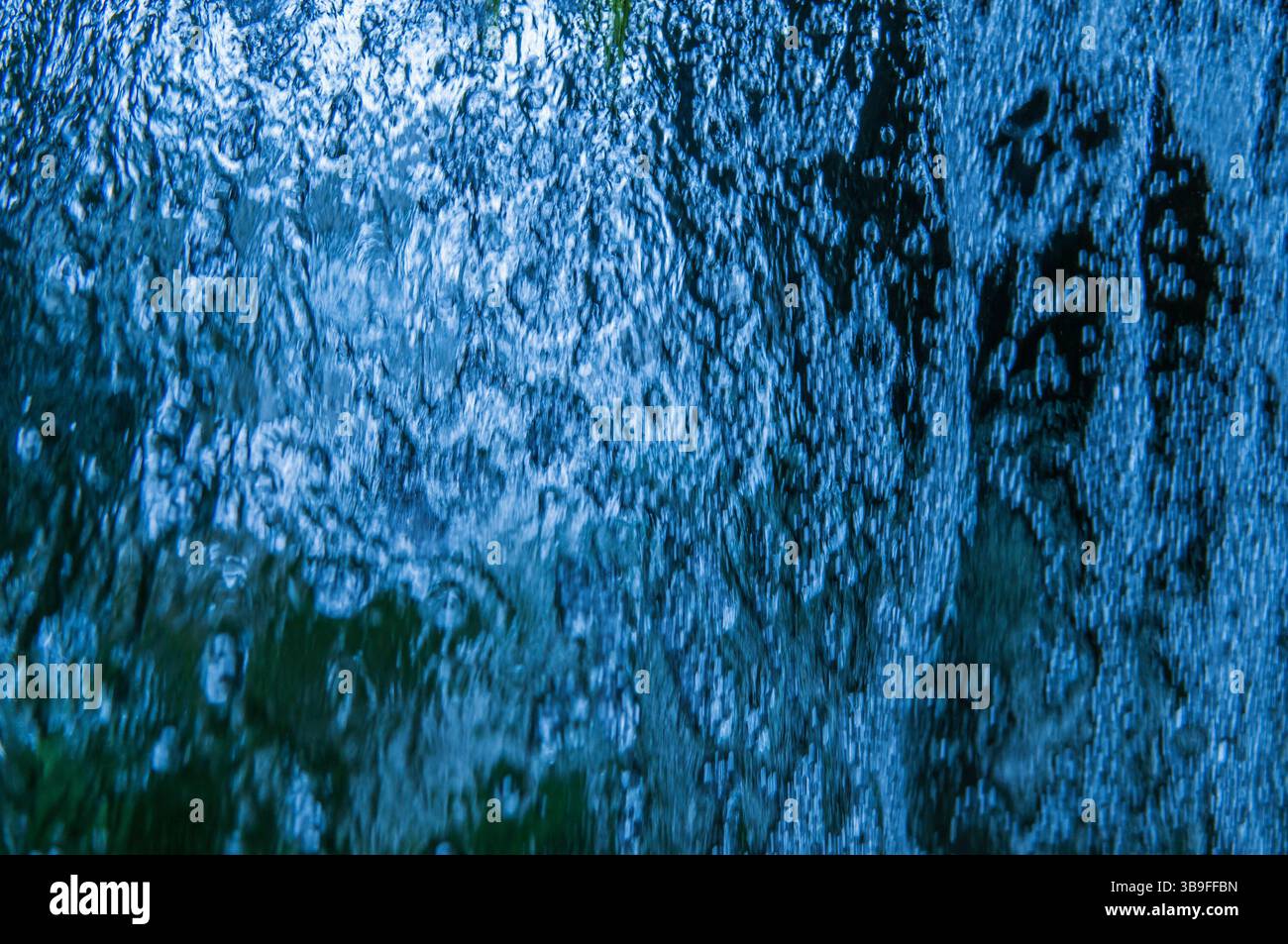 Falling water very blurred Stock Photo - Alamy