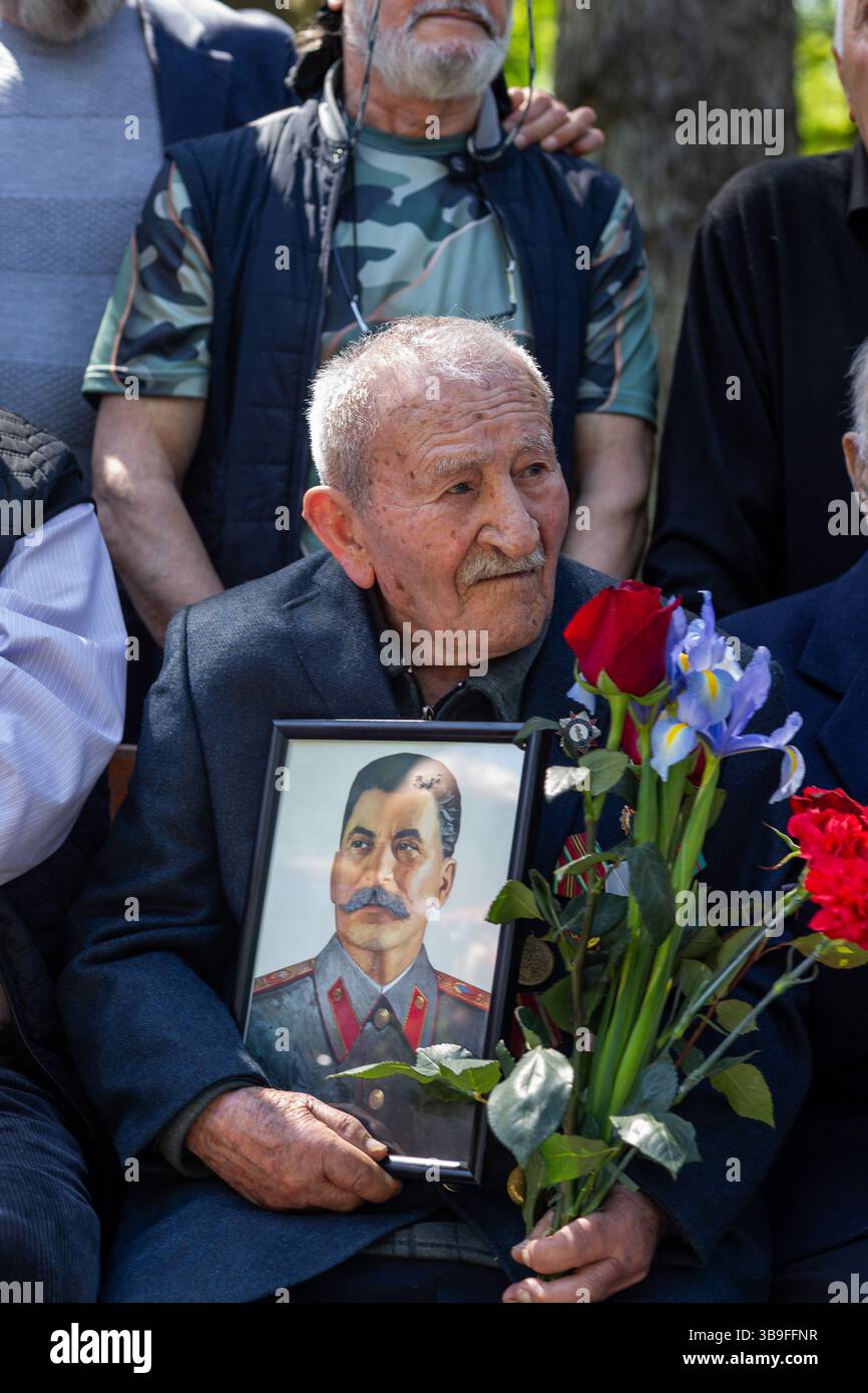 May 9, 2025, Tbilisi, Tbilisi, Georgia: Man holds picture of Stalin ...