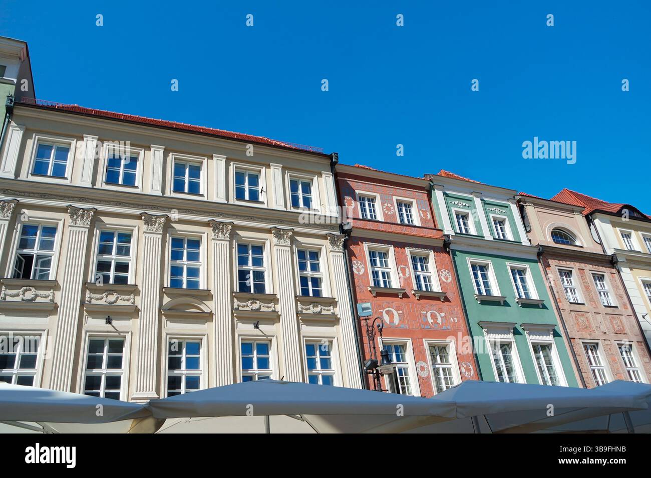 Historic facades on the market square in Poznan, Poland Stock Photo - Alamy