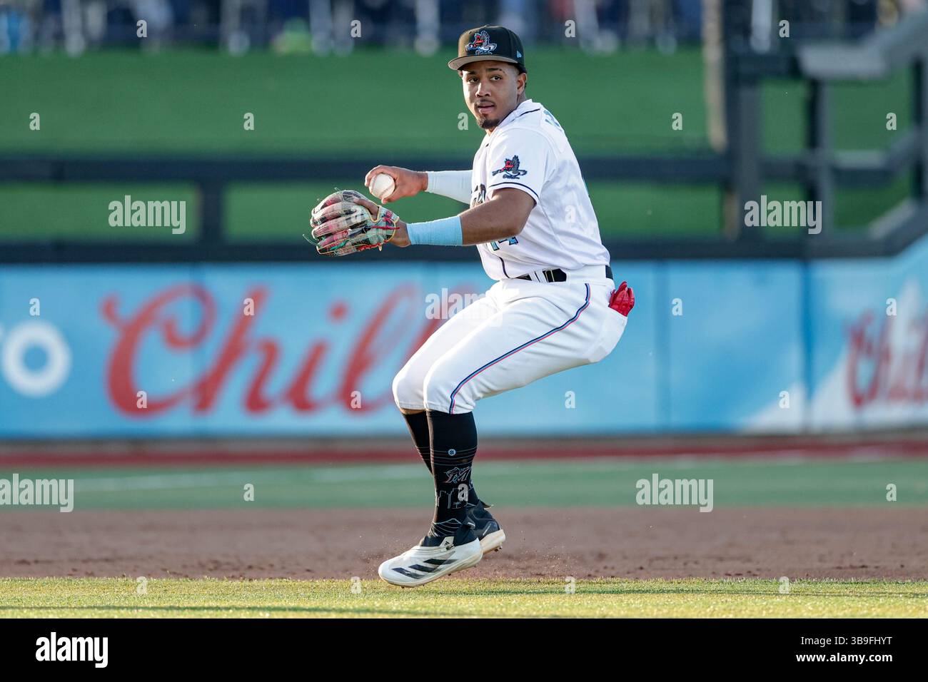 Beloit, WI. USA: Beloit Sky Carp infielder Echedry Vargas (14) fields ...