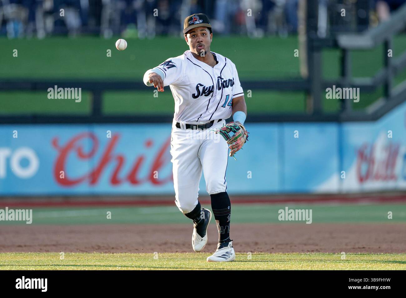 Beloit, WI. USA: Beloit Sky Carp infielder Echedry Vargas (14) fields ...