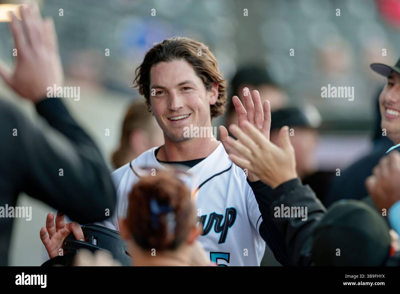 Beloit, WI. USA: Beloit Sky Carp infielder Michael Snyder (5) scores ...