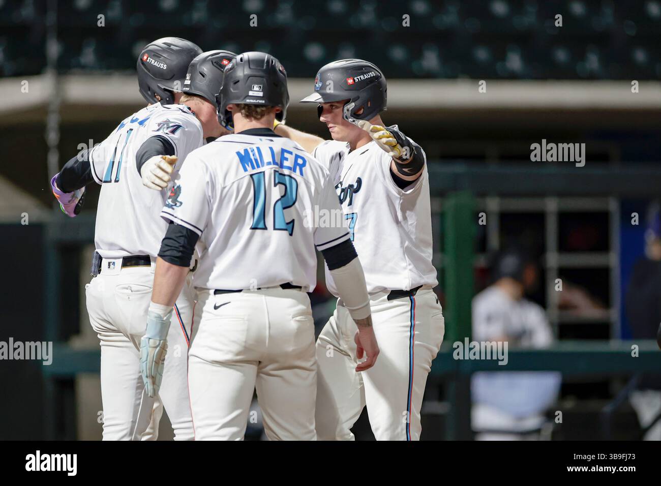 Beloit, WI. USA: Beloit Sky Carp outfielders Eric Rataczak (11) and ...