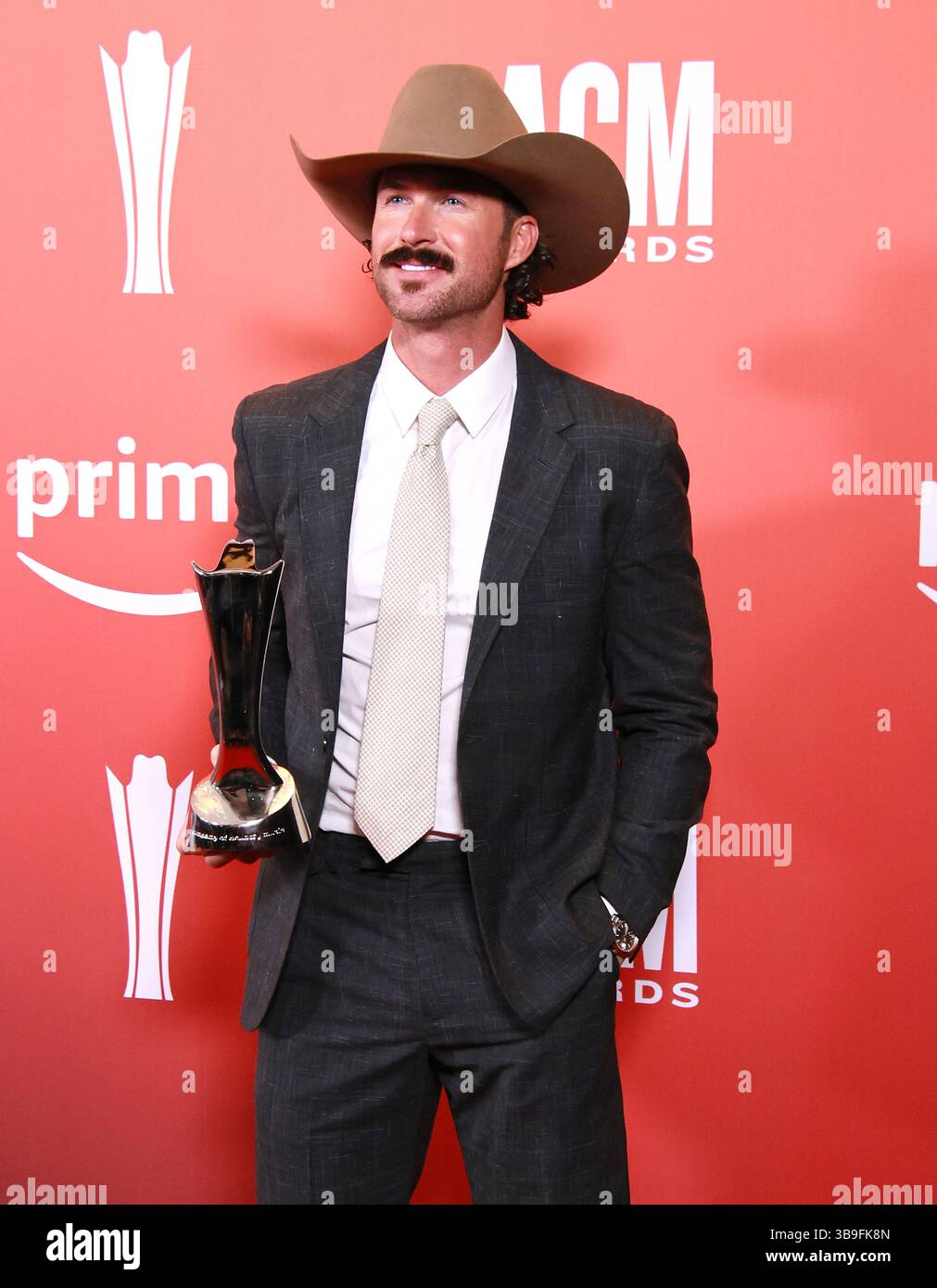 Riley Green poses in the press room during the 60th Academy of Country ...