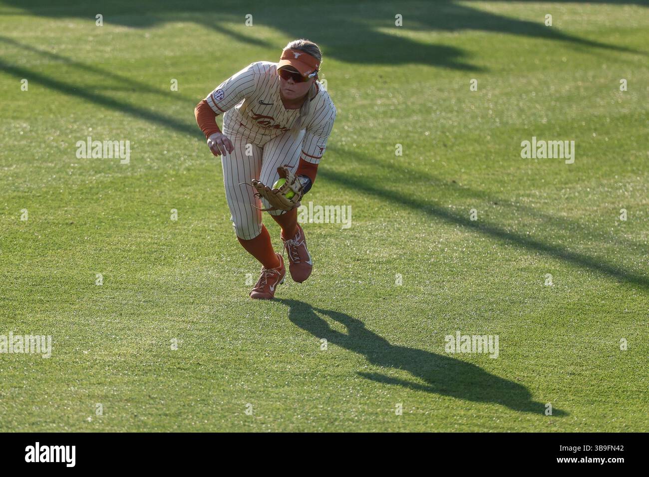 ATHENS, GA - MAY 08: Texas utility Kaydee Bennett (5) fields a ball in ...