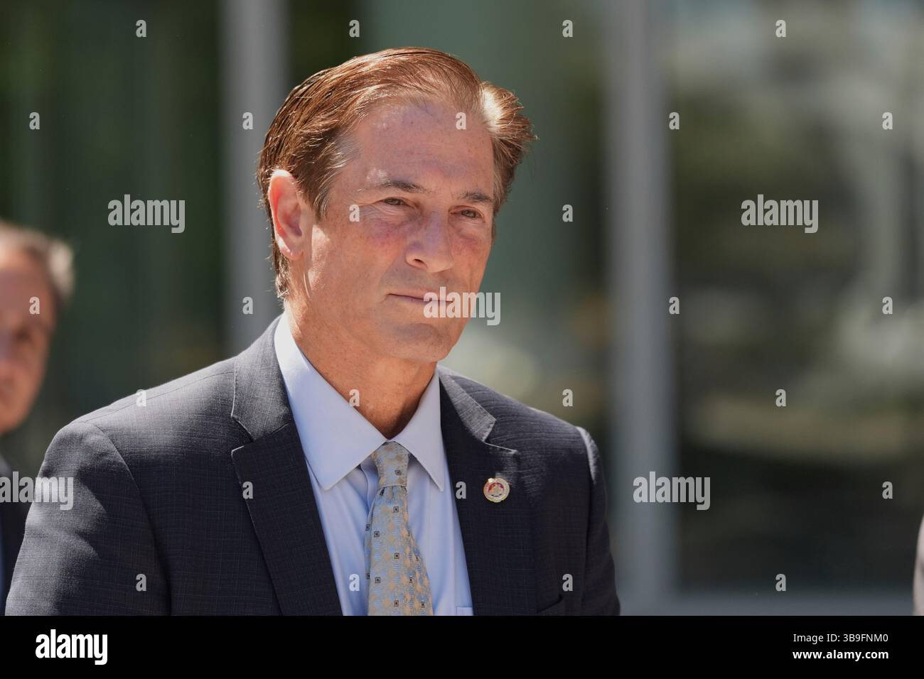 Los Angeles County District Attorney Nathan Hochman walks out of the ...