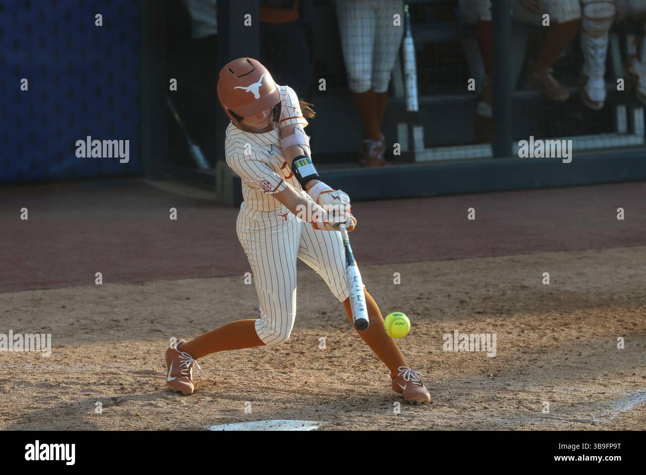ATHENS, GA - MAY 08: Texas utility Leighann Goode (43) hits a ground ...
