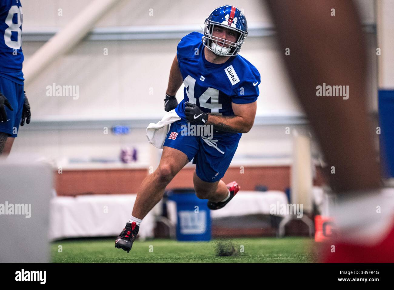 New York Giants running back Cam Skattebo (44) runs drills during the ...