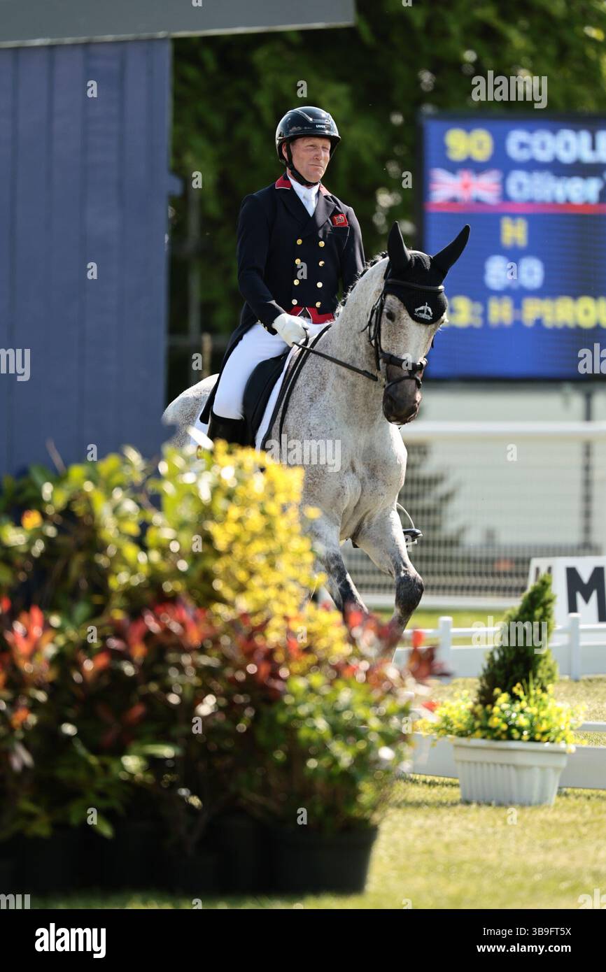 Oliver Townend of Great Britain with Cooley Rosalent during the ...