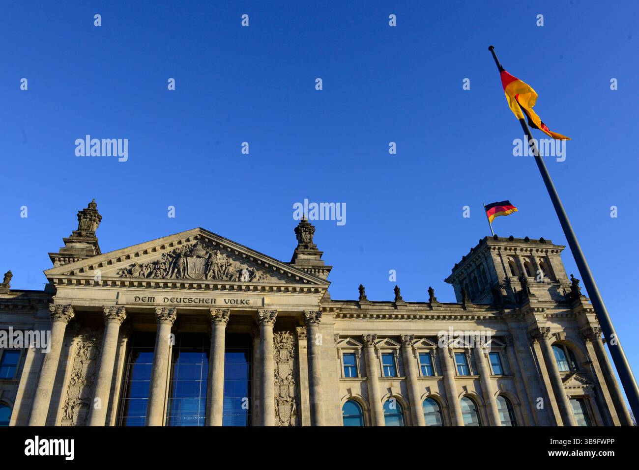 The Reichstag building in Berlin. Entrance with columns and German ...