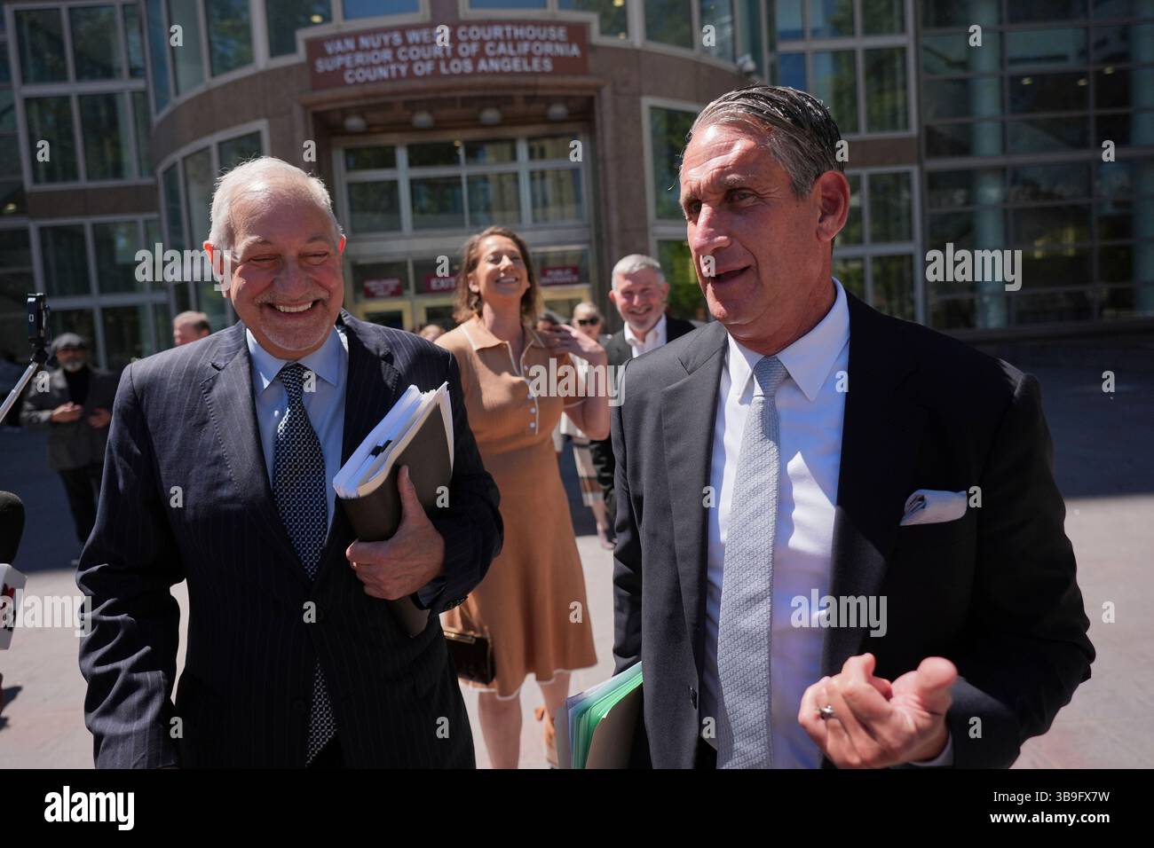 Attorney Mark Geragos, a lawyer for Erik and Lyle Menendez, left, talks ...